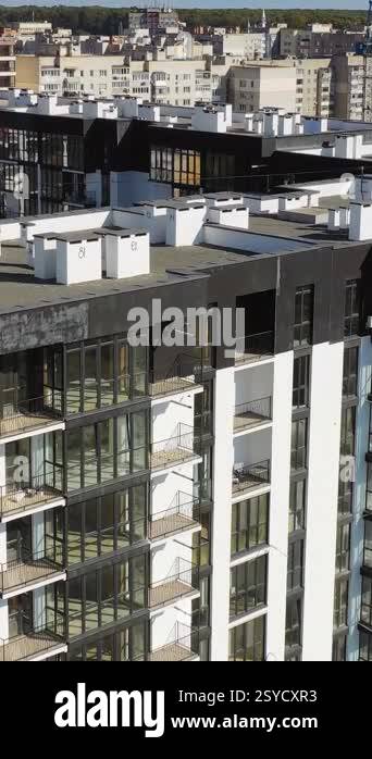 New architecture in the city. High-raise apartment buildings near the ...
