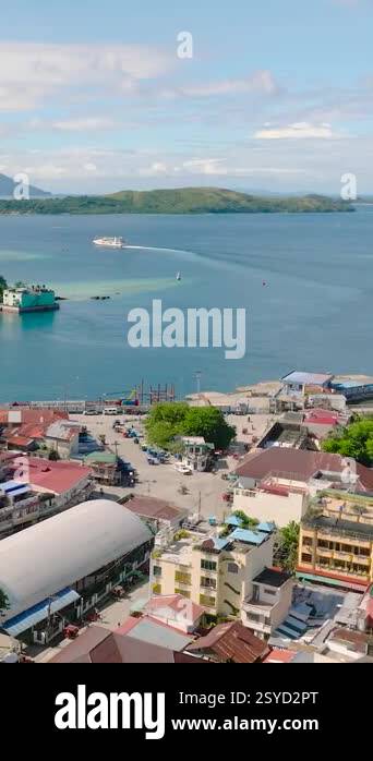 Aerial view of commercial buildings and streets in Romblon Island ...