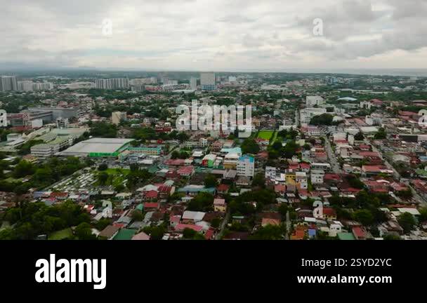 Aerial view of Iloilo City with commercial buildings and resident area ...