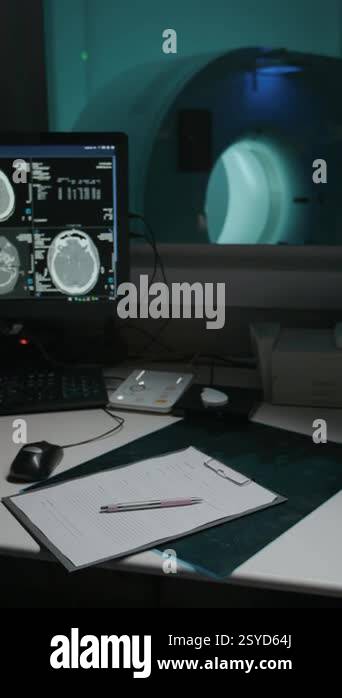 Medium vertical no people shot of desk of radiology diagnostician at ...