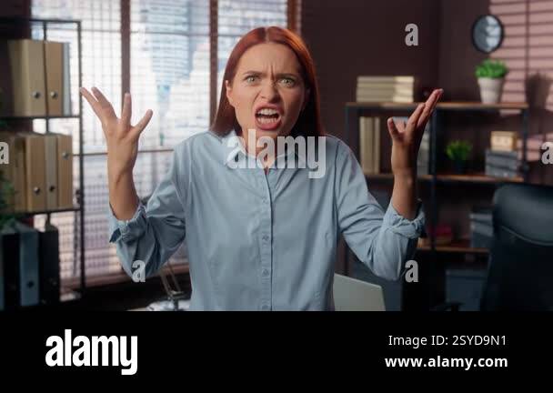 Portrait Caucasian girl angry furious rage mad aggressive business ...