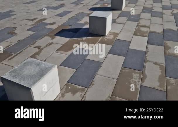 stone blocks as barriers to protect square and chocs. cubes on the ...