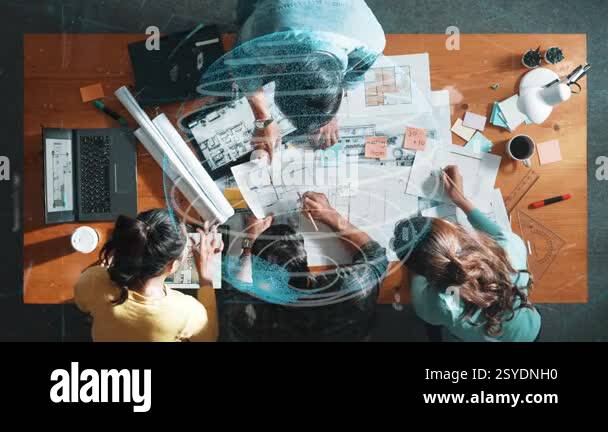 Top down aerial view of civil engineer team holding blueprint at ...