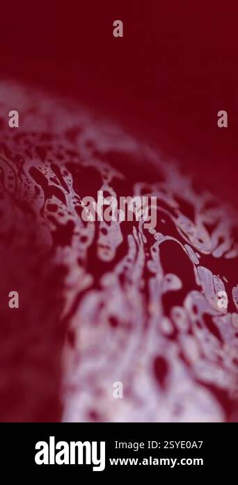 Vertical video. Acid foam. Chemical fluid. Defocused red blue color ...