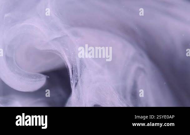 Shimmer liquid. Dust magic. Defocused purple cloud paint ink mist ...