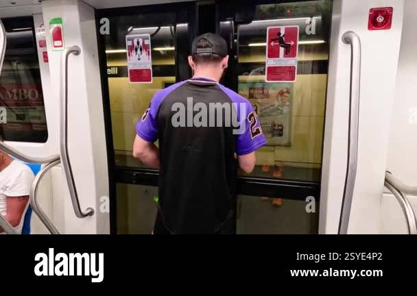 Man exits train and walks through station Stock Video Footage - Alamy