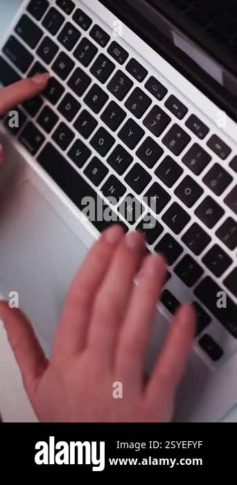 Close up of womans hands typing at laptop keyboard in office. Locked ...