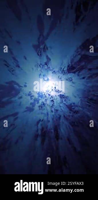Blue paint splatter vertical background with liquid explosions in blue ...