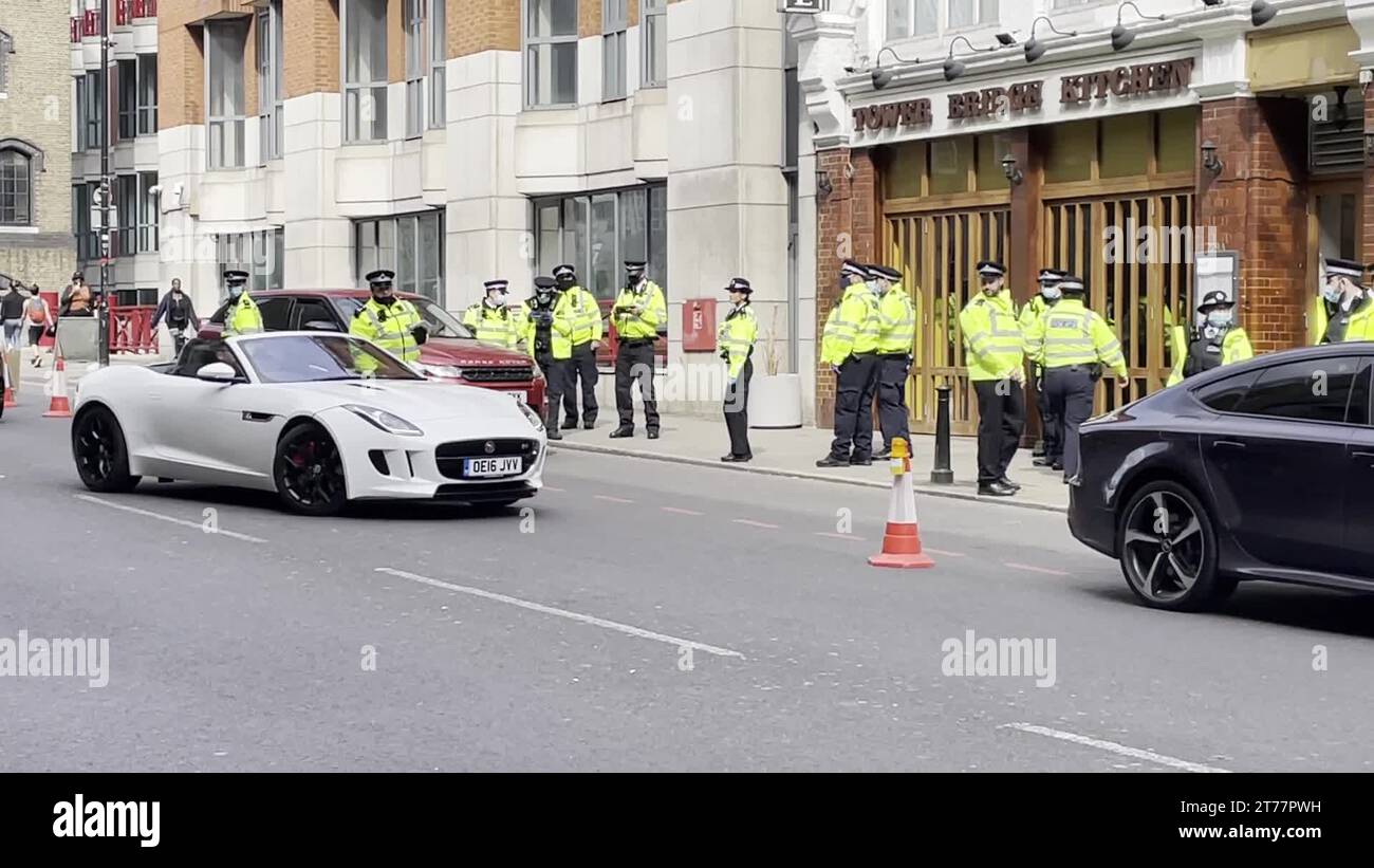 Heavy police presence road Stock Videos & Footage - HD and 4K Video ...
