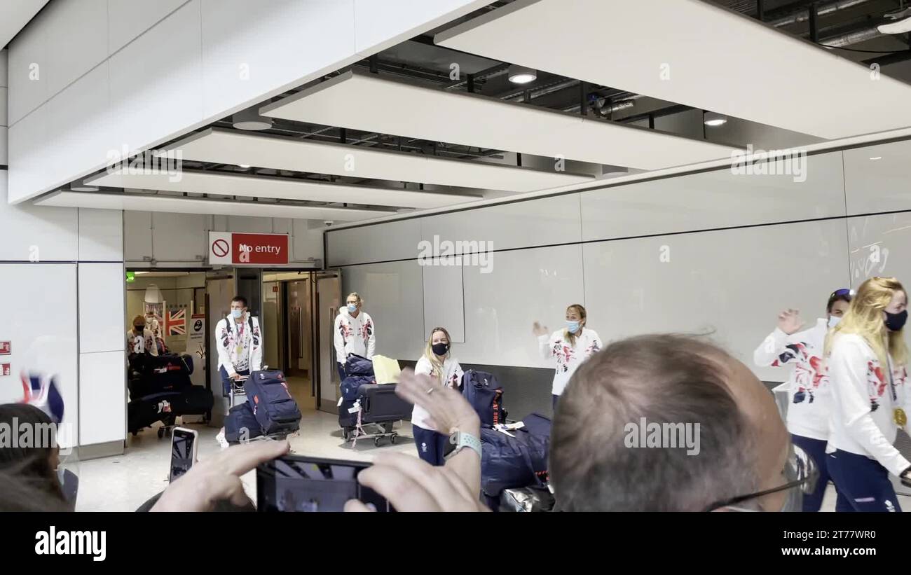 Team GB athletes reunite with family at Heathrow Stock Video Footage ...