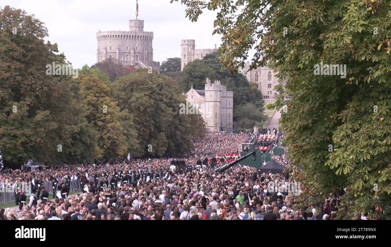 Thousands line the late Queen’s procession route as it makes a final ...