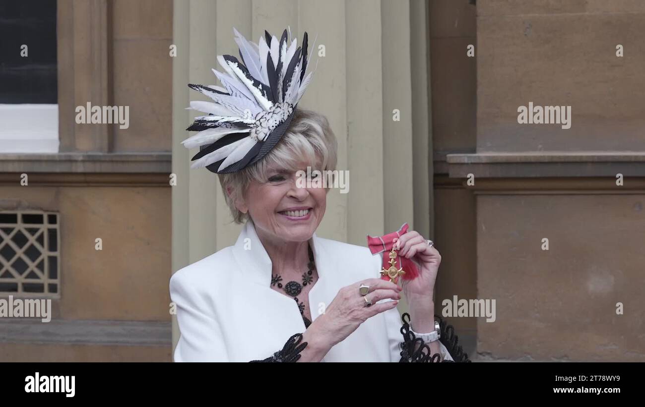 Receives an obe from the queen at buckingham palace Stock Videos ...