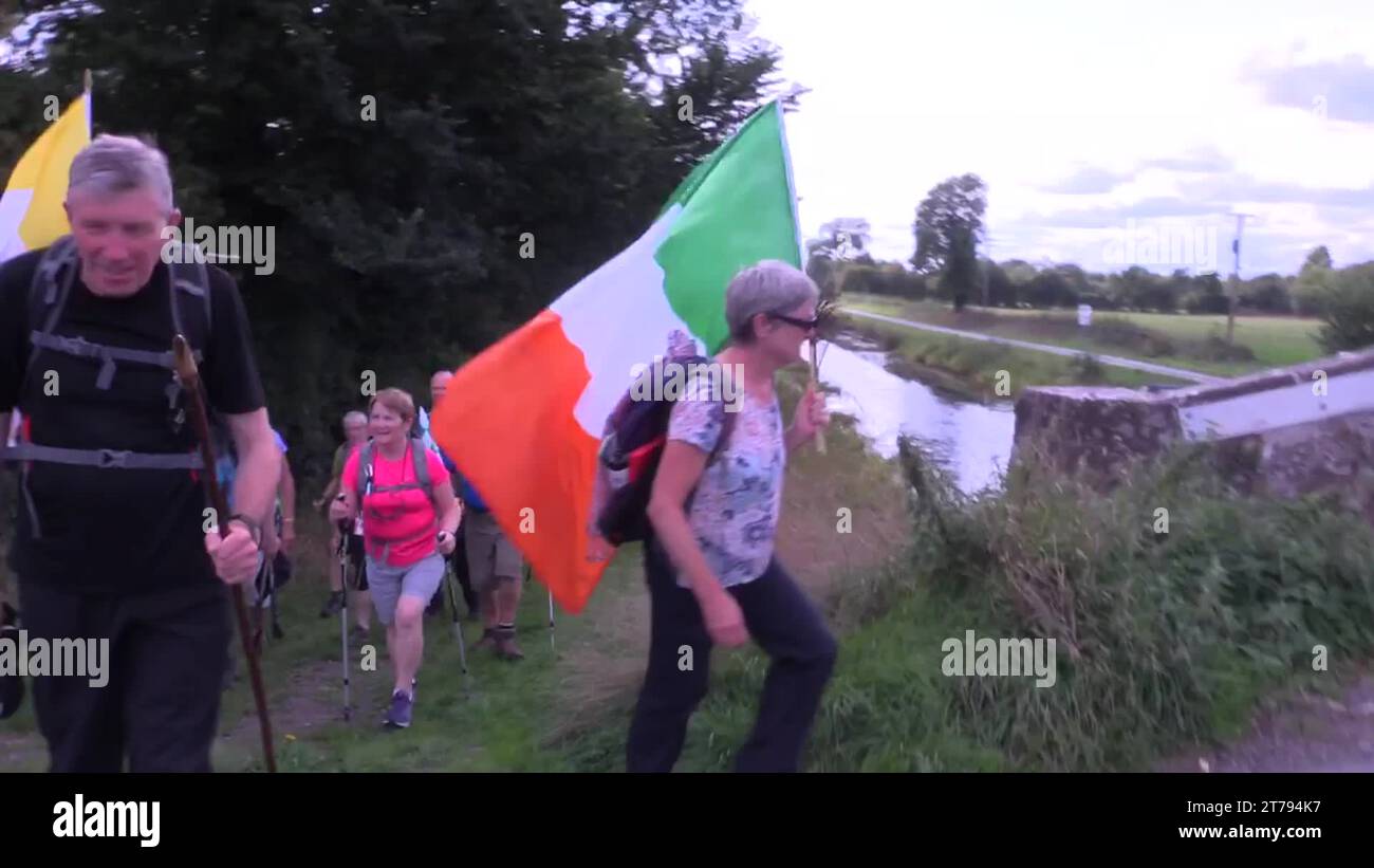 Pilgrims take on 220km walk for Papal mass Stock Video Footage - Alamy