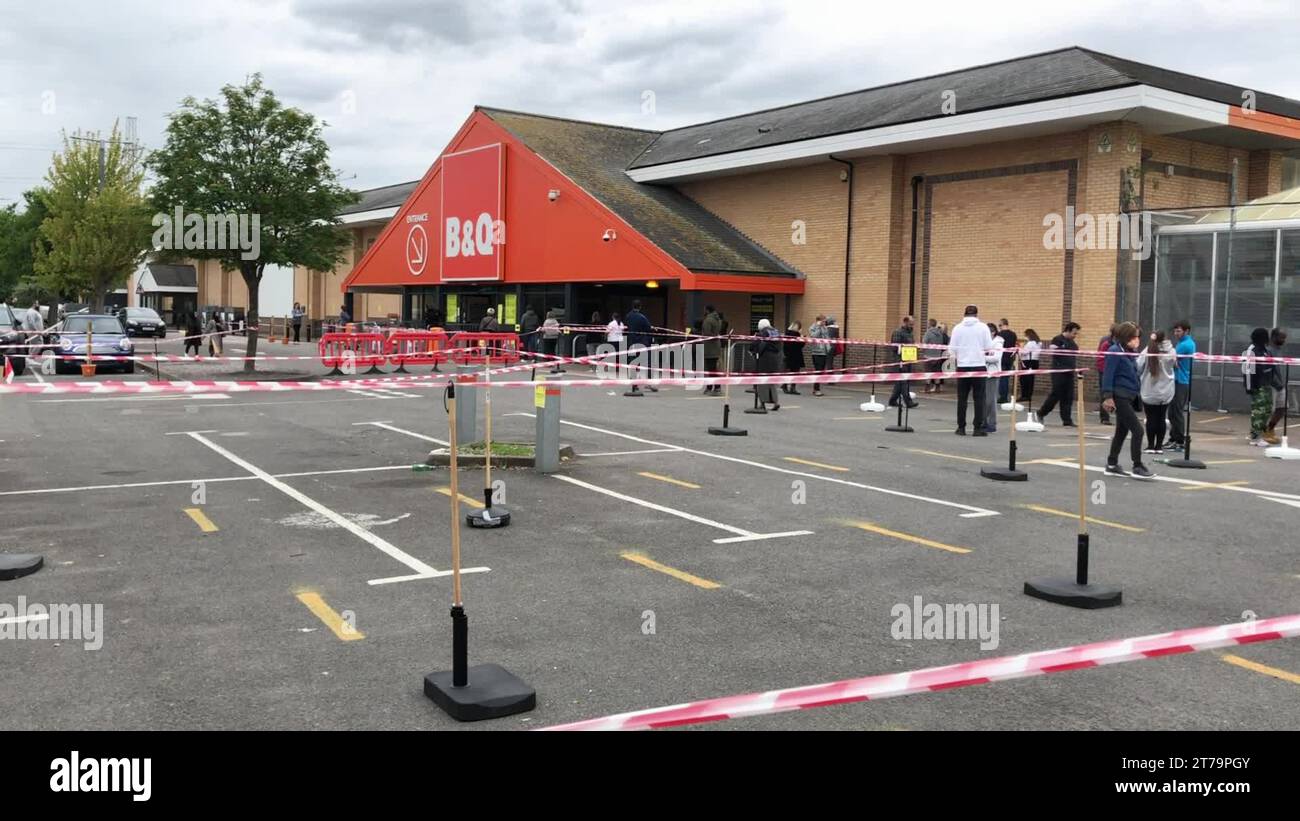 Queues outside B&Q as DIY giant reopens 288 stores Stock Video Footage ...