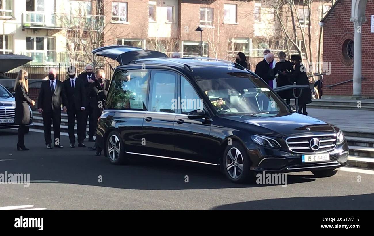 Dr Tony Holohan leaves church after funeral for his wife, Dr Emer Feely ...