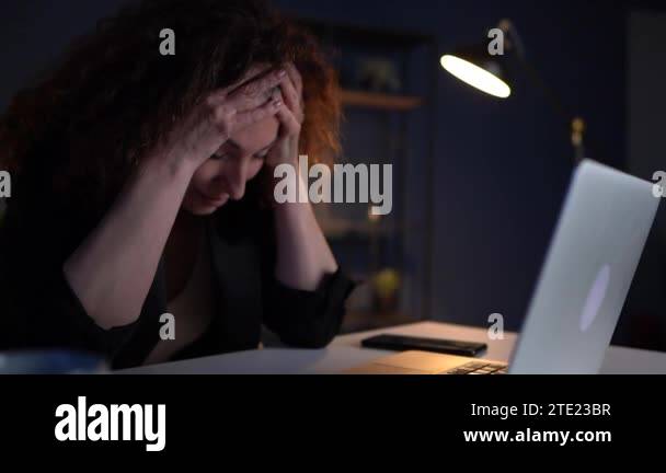 Angry tired woman office manager are working late at night. Stressed ...