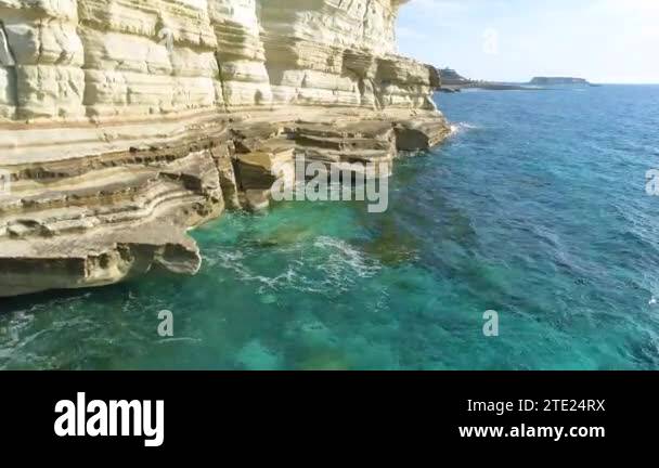 Steep Rocky cliff over the ocean, Beautiful tourist landscape. 4k ...