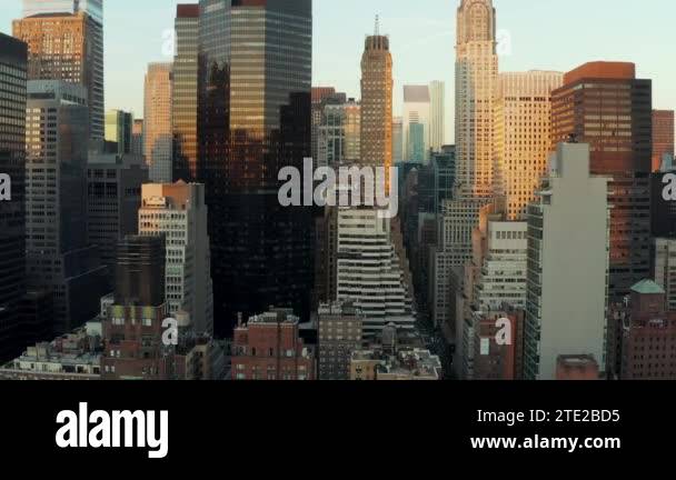 Modern high rise buildings with glossy glass facades reflecting ...