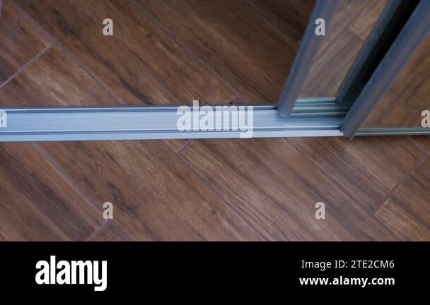 Mirrored doors in the apartments. The system of sliding doors in the ...