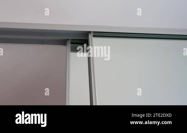 Mirrored doors in the apartments. The system of sliding doors in the ...