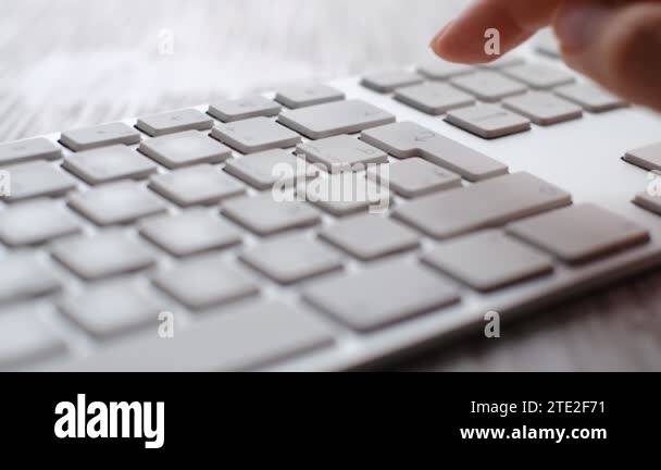 Finger Pressing An Enter Key Computer User Hitting The Enter Key Up Close Confirmation