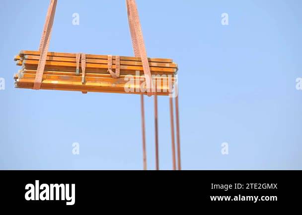 The formwork is lifted on a crane. Formwork for creating reinforced ...