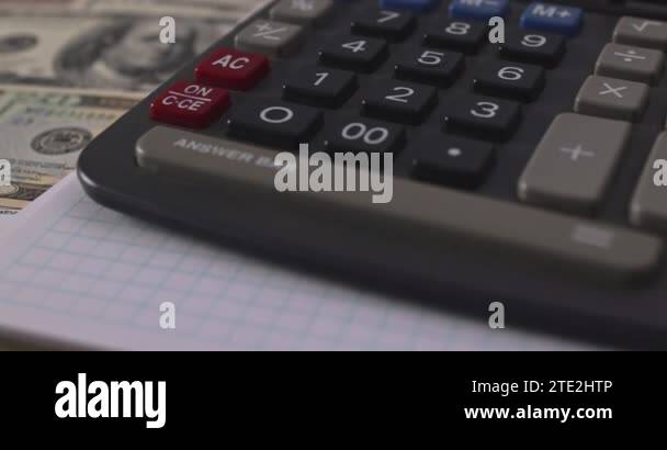 IRS form 1040 with individual income tax return of dollar bills of ...