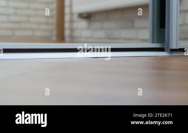 Mirrored doors in the apartments. The system of sliding doors in the ...