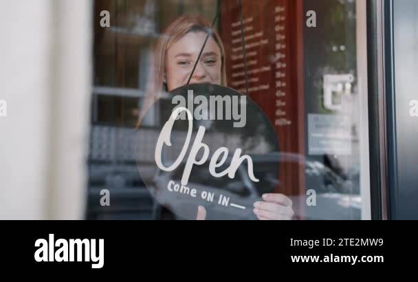 coffee seller turning closed sign board, cafeteria its closed for ...