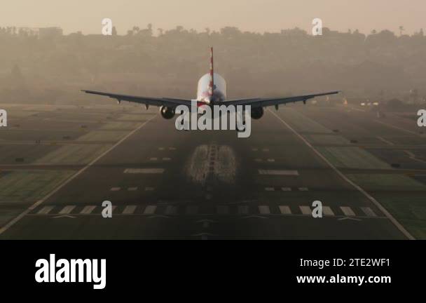 Passenger aircraft using chassis for landing along an airport runway ...