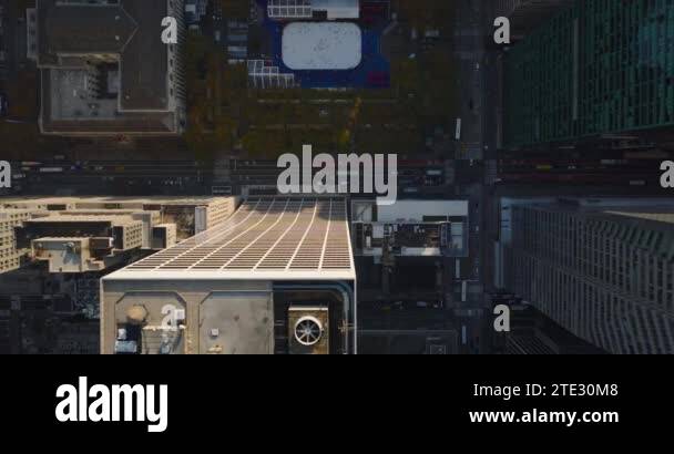 Aerial birds eye overhead top down view of streets in city. Outdoor ice ...