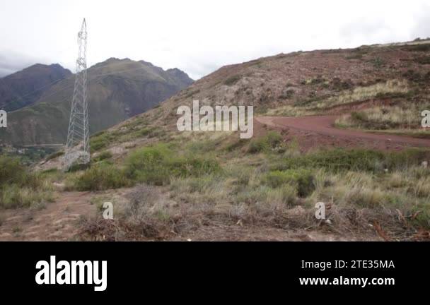 Electric tower in middle of the Peruvian Andes. Electric pylon in high ...
