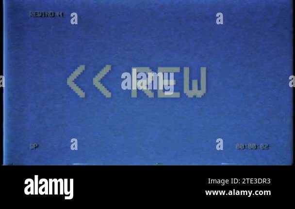 VHS video tape rewind process with on-screen symbol, tape damage and ...