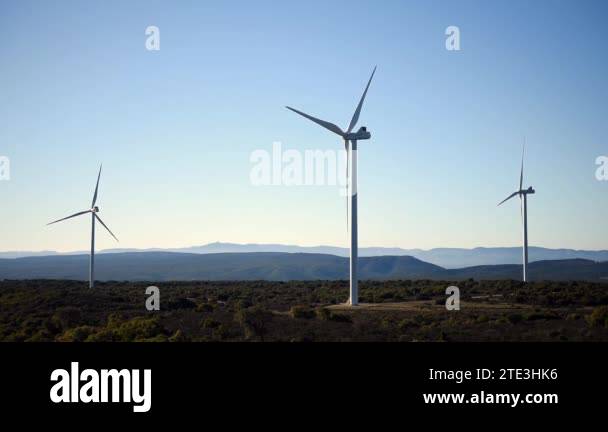 Wind turbines on a beautiful blue sky in a mountain wind farm in ...