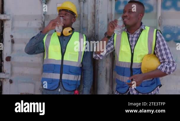 Two construction workers of African descent During their break from ...