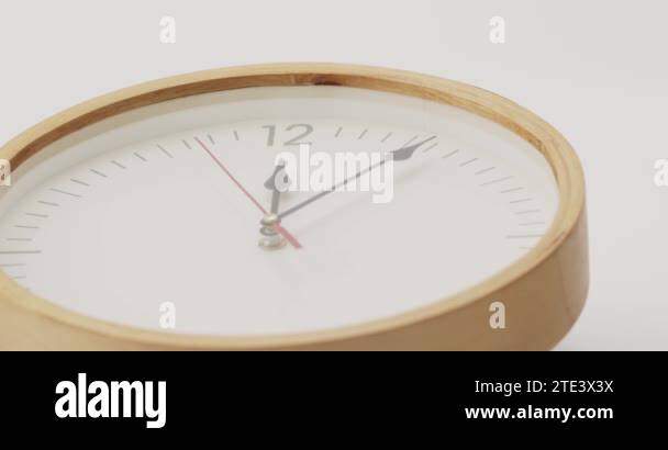 Zoom in wood wall clock tell the time 12 o'clock. It's time to take a ...