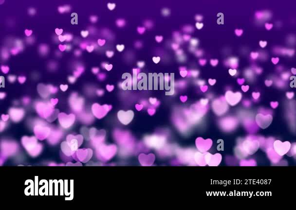 Heart particle animated background video. Purple love hearts bokeh sparkle glitter particle ...