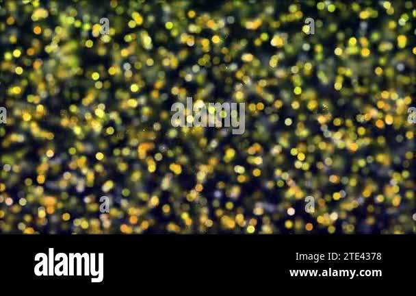 Yellow color Delightful soft light bokeh and particles visuals with ...