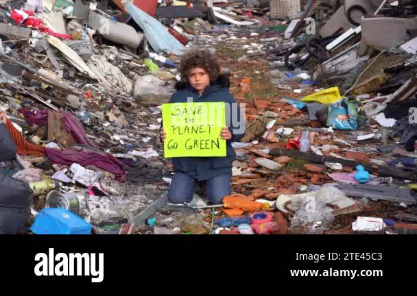 7-year-old child environmentalist and ecologist holding a sign with the ...