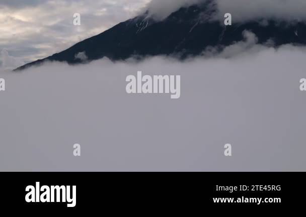 Volcano dawn in white clouds Stock Videos & Footage - HD and 4K Video ...