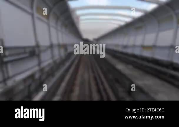 Blurred defocused Timelapse to real speed effect automatic train moving through tunnels via ...