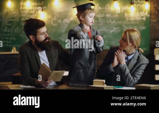 Early childhood education. Family studying. English grammar lesson ...