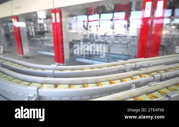 Automated plant, conveyor line. Modern plant. Machines work. Poduction ...