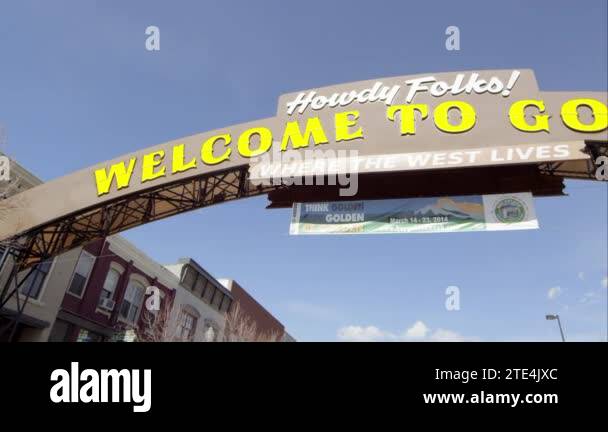 Up close wide pan to the right of the Welcome to Golden Colorado Sign ...