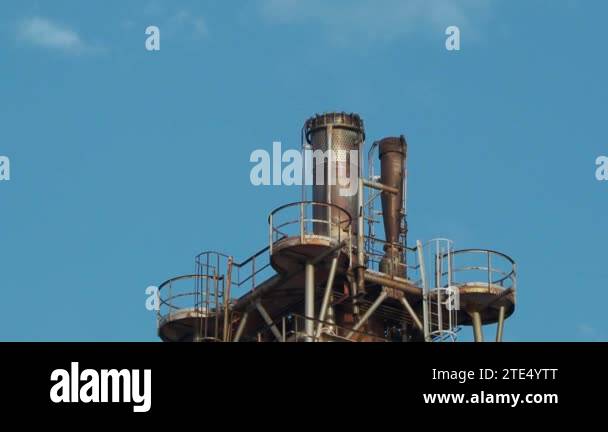 Burning off excess gas at Oil refinery petrochemical plant factory from ...