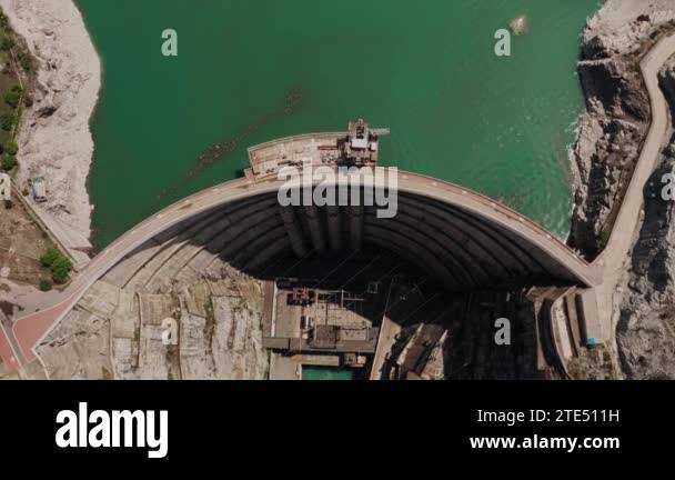 Water reservoir and a dam in Dagestan Aerial view of the concrete dam ...