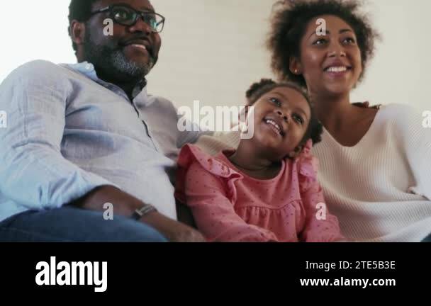 Family watching tv talking Stock Videos & Footage - HD and 4K Video Clips - Alamy