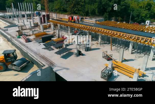 Construction process of a modern football stadium. Builders make ...