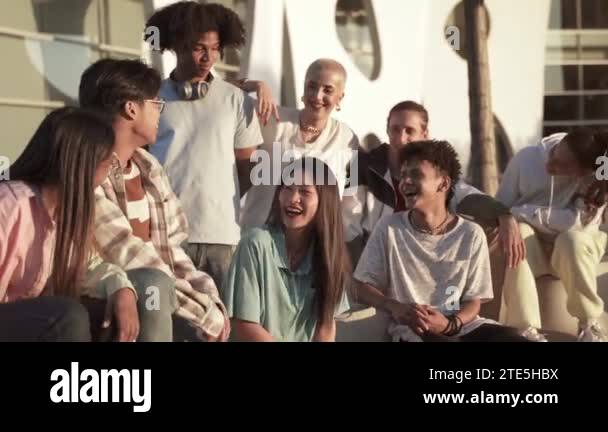 Multiethnic group of gen z teenager friends having fun, laughing and ...