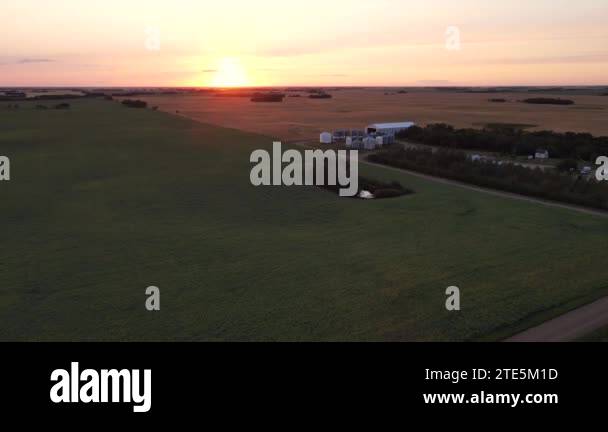 Drone flying by a family operated farm in rural Alberta. Incredibly ...